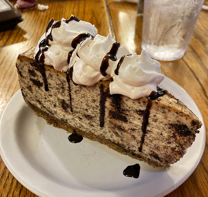 A slice of chocolate cheesecake that makes you wonder if dessert should actually be the first course. Life's uncertain, after all.