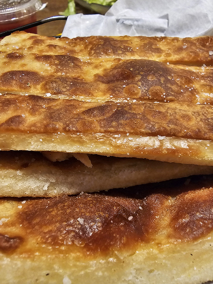 These breadsticks aren't just side characters&mdash;they're the main event, with a golden exterior that shatters just right with each satisfying bite.