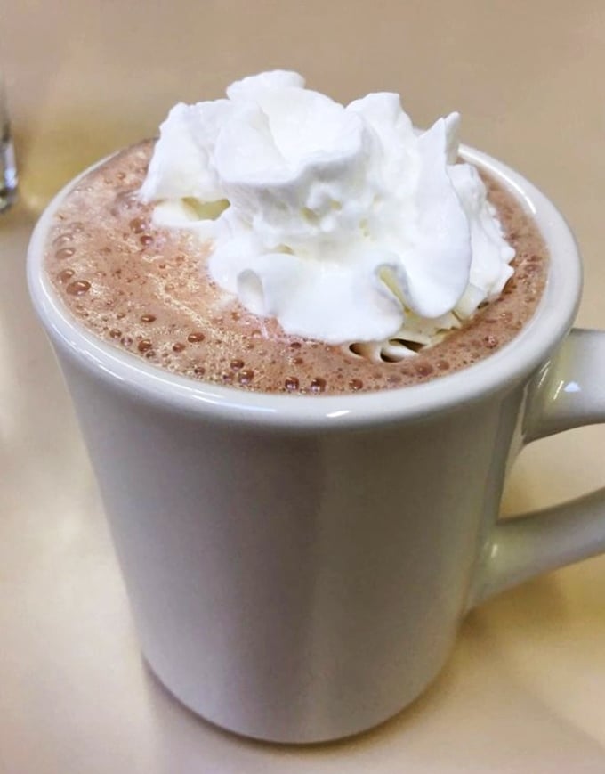 Hot chocolate topped with a cloud of whipped cream&mdash;because sometimes coffee needs to step aside for something sweeter.