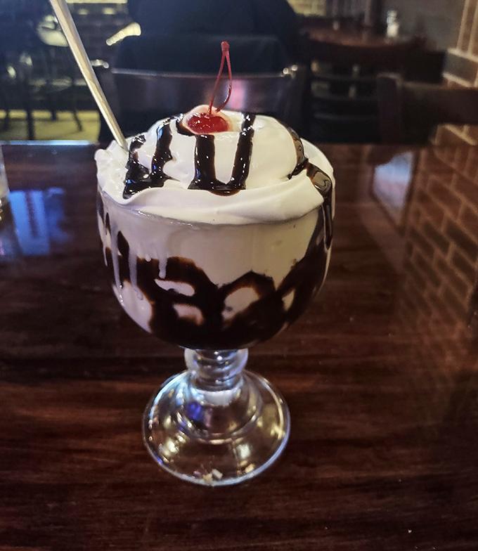 Dessert here isn't an afterthought&mdash;this hot fudge sundae with its rivers of chocolate and cloud of whipped cream is the grand finale your meal deserves.