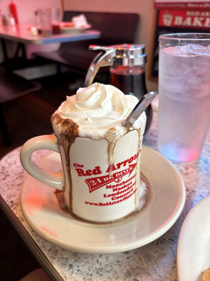 Hot chocolate at Red Arrow isn't just a beverage&mdash;it's an event, complete with whipped cream mountain and a mug that doubles as a souvenir.