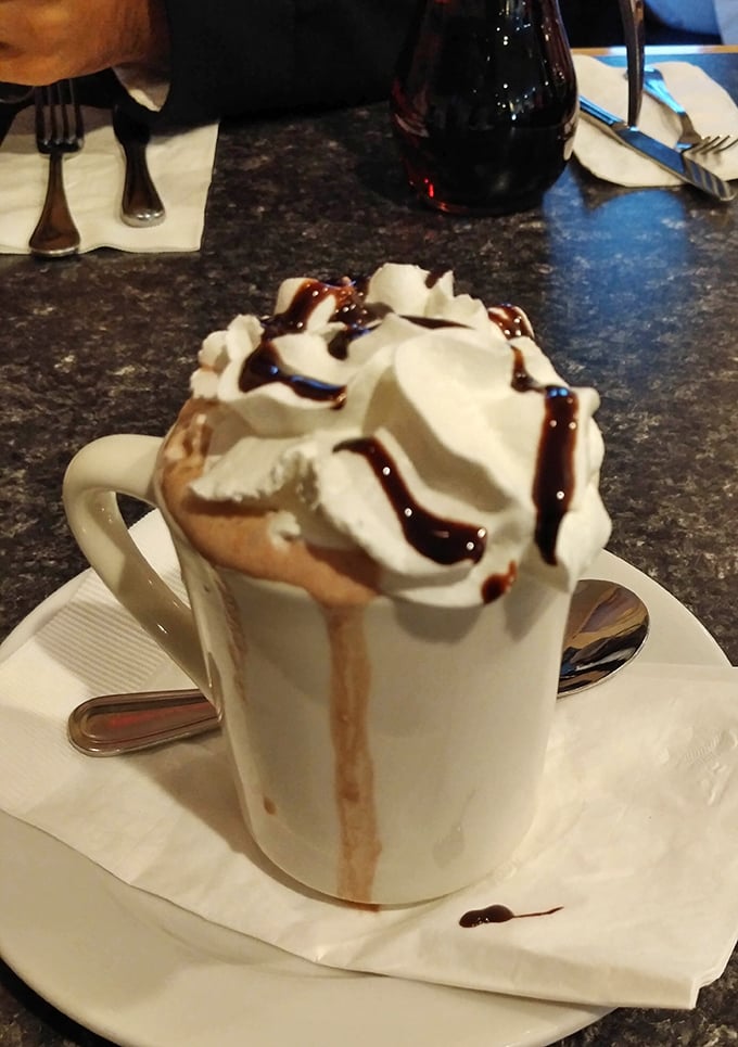 Hot chocolate that's dressed for Vegas with a whipped cream pompadour and chocolate drizzle. Elvis would approve of this sweet indulgence.