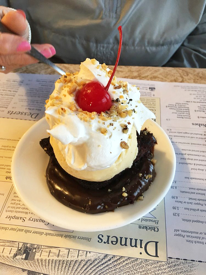 A hot fudge cake that doesn't just satisfy your sweet tooth&mdash;it throws a party for it, complete with whipped cream hat and cherry crown.