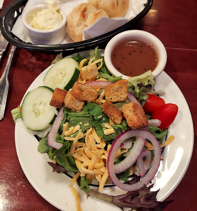 A salad that doesn't apologize for being a salad—crisp, colorful, and substantial enough to earn its place at a steakhouse table.