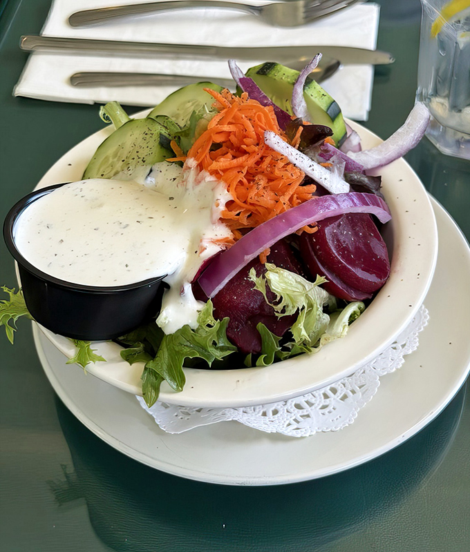 Even the salad deserves its moment in the spotlight&mdash;crisp, colorful, and proving that vegetables can party just as hard as the seafood.