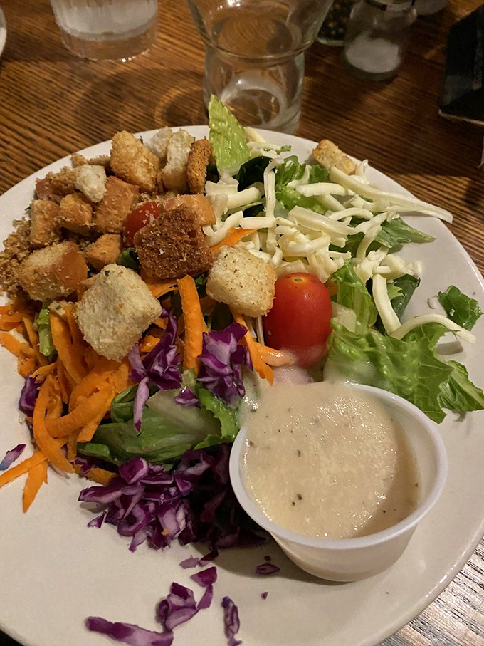 Even the house salad gets the royal treatment with colorful veggies and homemade croutons that crackle with each bite.