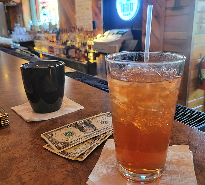 A glass of iced tea catching the bar lights just right &mdash; simple, crisp, and ready to cool down a long day the easy way.