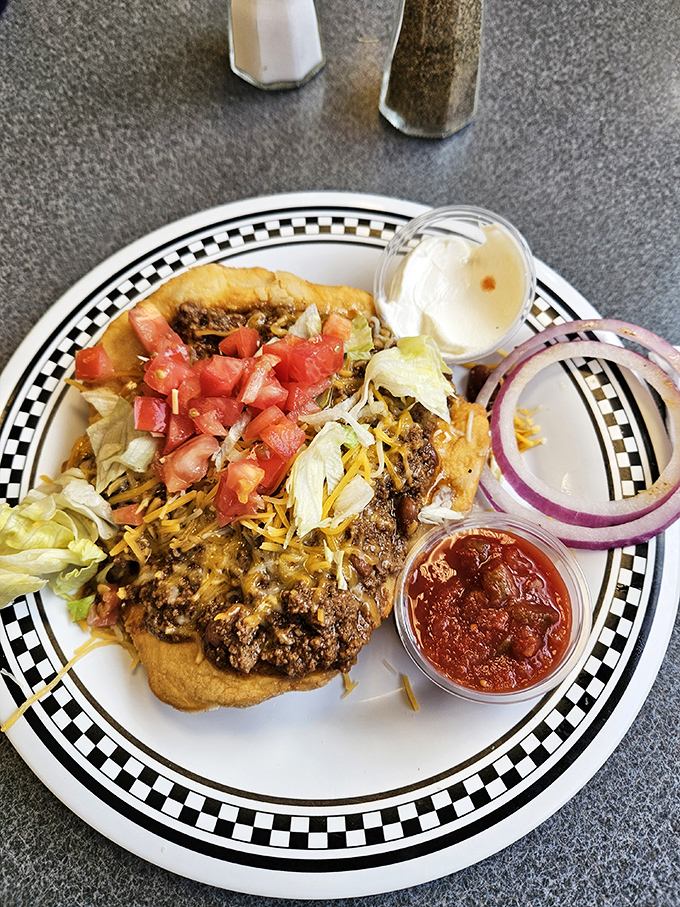 An open-faced masterpiece that proves Oklahoma knows its way around comfort food&mdash;this taco-inspired creation defies easy categorization.