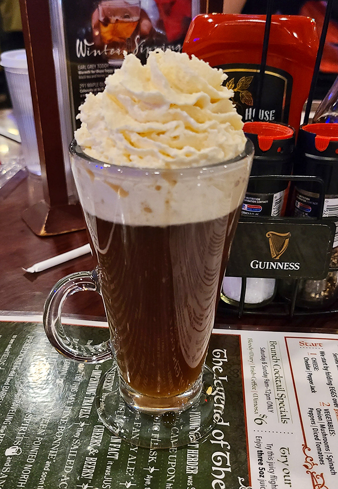 The Irish Coffee &ndash; where caffeine meets whiskey in perfect harmony, topped with cream so thick you could practically float a penny on it.