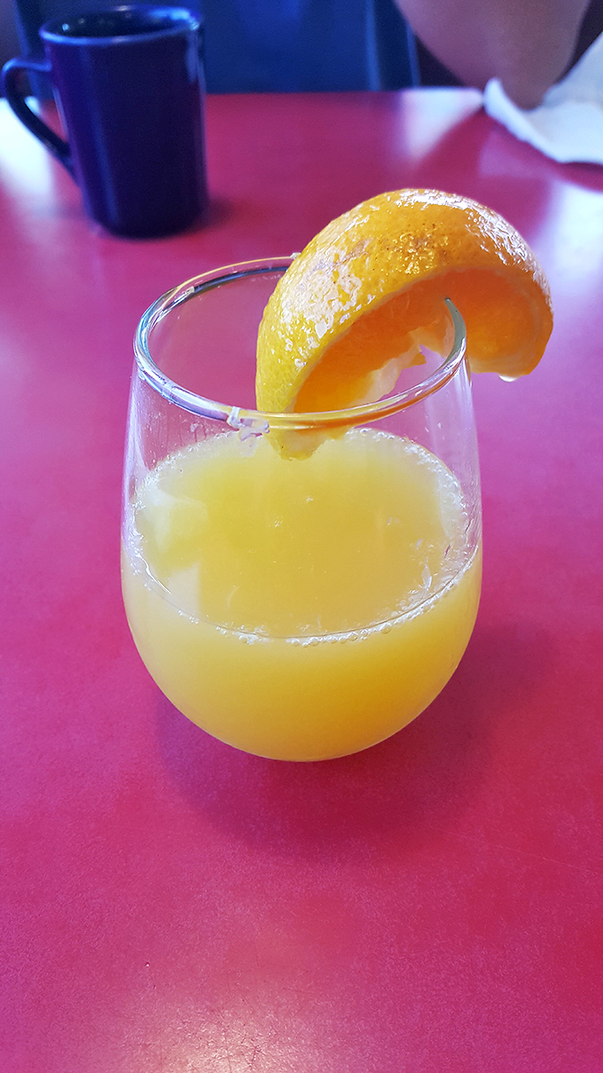 Nothing says "vacation mode activated" quite like fresh-squeezed mimosas with that perfect orange-to-bubbly ratio.