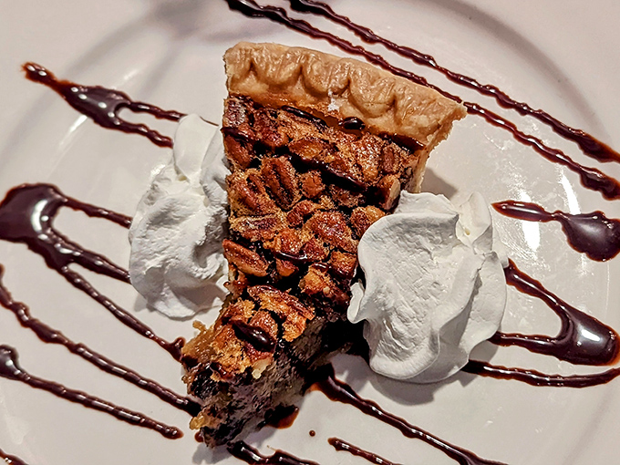 This pecan pie isn't just dessert&mdash;it's a sweet Southern symphony with a perfectly flaky crust and filling so rich it could probably buy a small country.