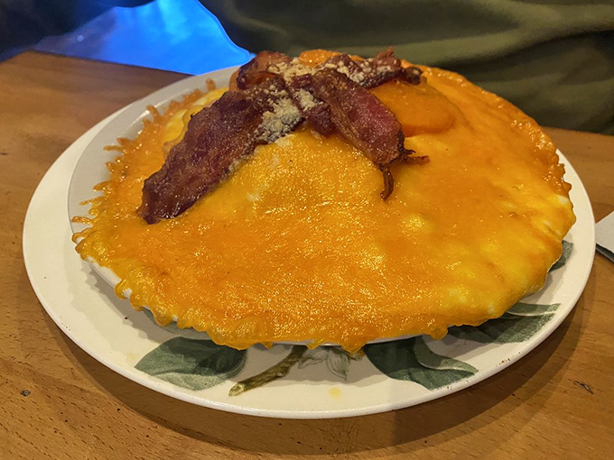 The legendary Kentucky Hot Brown—an open-faced masterpiece that combines turkey, bacon, and cheese sauce in a way that makes you question why sandwiches need tops.