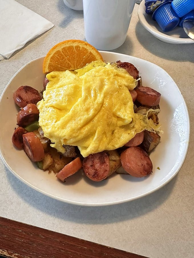 Eggs lounging atop a mountain of sausage and potatoes &ndash; the breakfast equivalent of a warm hug from someone who truly gets you.