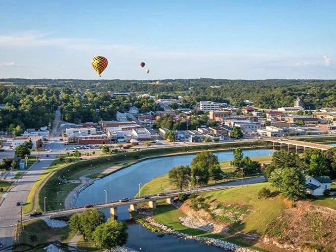 Hot air balloons drifting over Harrison's lake create the kind of postcard moment that makes you reach for your camera instead of your stress medication.