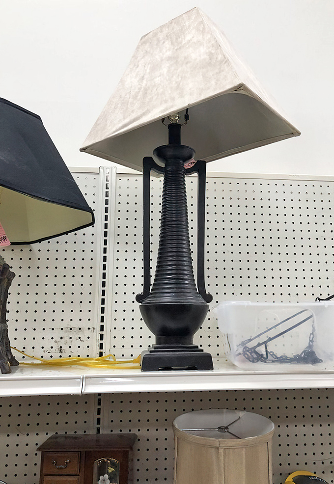 This stately black lamp isn't just lighting&mdash;it's conversation-starting d&eacute;cor that whispers, "Yes, I have excellent taste on a shoestring budget."