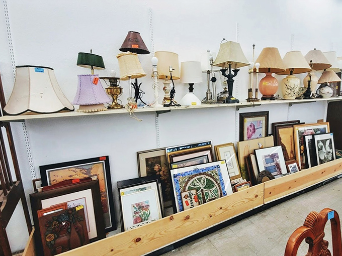 Illumination inspiration! One person's "that old lamp from Aunt Mildred" becomes your living room's conversation piece. The framed art sweetens the deal.