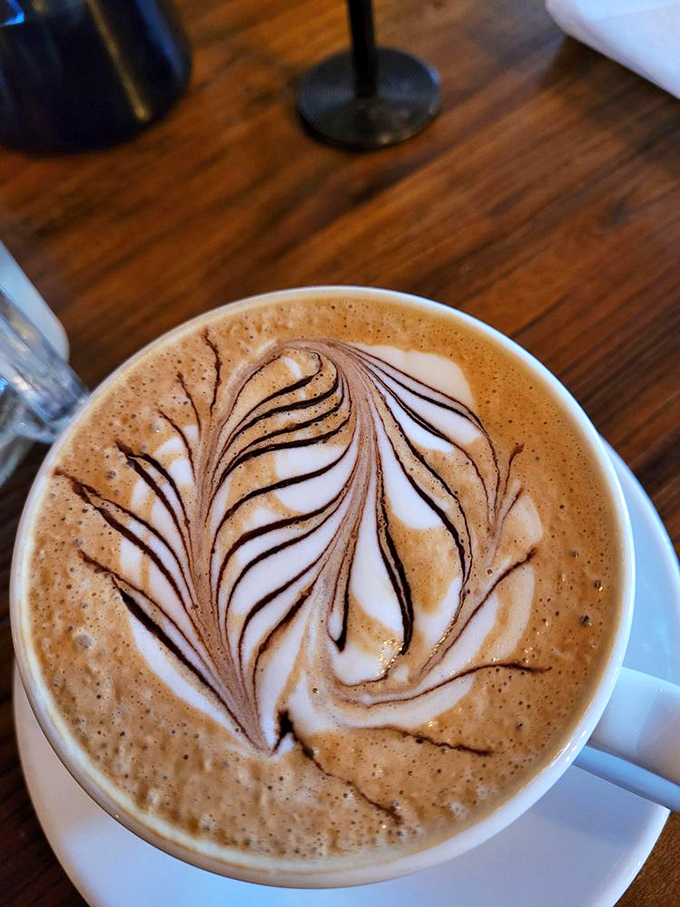 Coffee art so pretty you almost don't want to drink it &ndash; almost. This latte's leaf design deserves its own gallery showing.