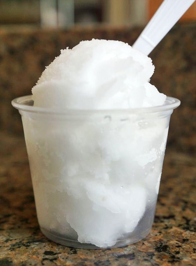 A cup of Italian ice so pristine it looks like Ohio snow, but tastes like Sicilian sunshine. The perfect palate cleanser between pastry adventures.