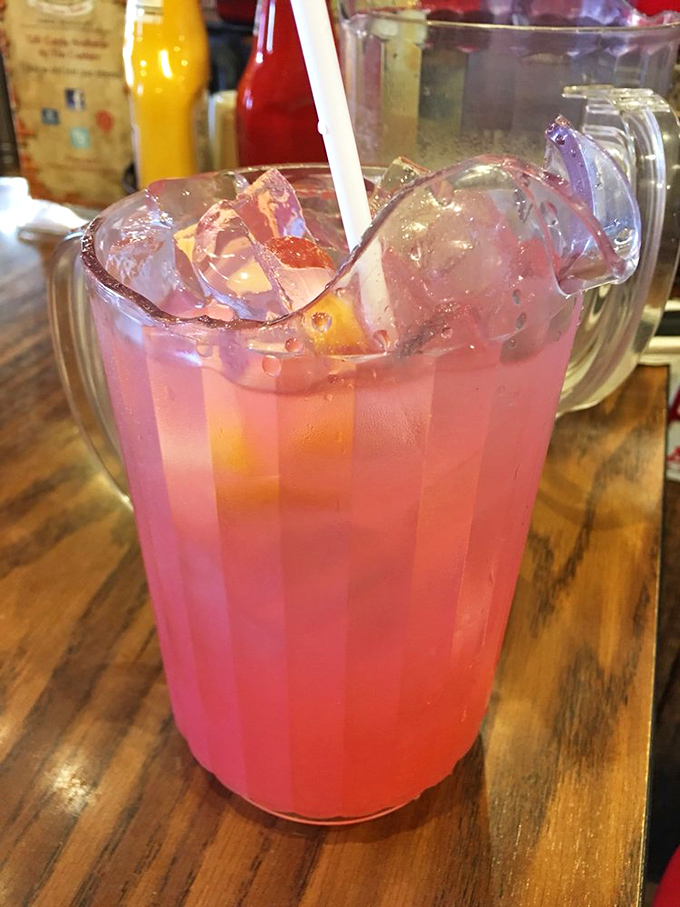 Pink lemonade so vibrant it could double as a sunset. This isn't just refreshment; it's Florida sunshine in a glass.