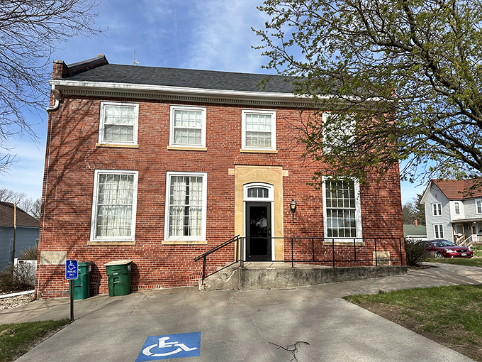 The brick library stands as Corning's intellectual heart, where community knowledge is shared through both books and neighborly conversations.