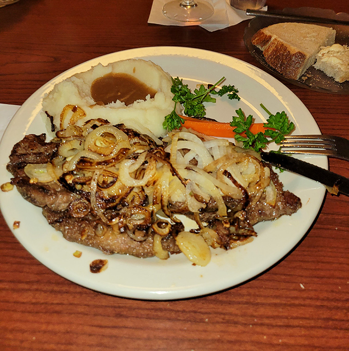 Liver and onions&mdash;the dish that separates casual diners from true comfort food aficionados&mdash;caramelized to sweet-savory perfection atop a bed of buttery mashed potatoes.