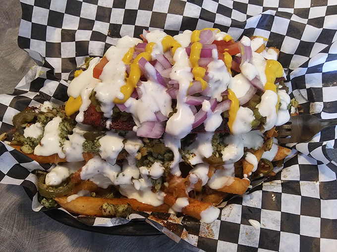 Loaded fries that don't know the meaning of moderation. Every bite delivers a different combination of toppings in what can only be described as potato paradise.