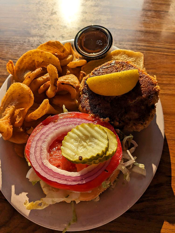 A sandwich that requires both hands and several napkins—the way proper seafood should be served.