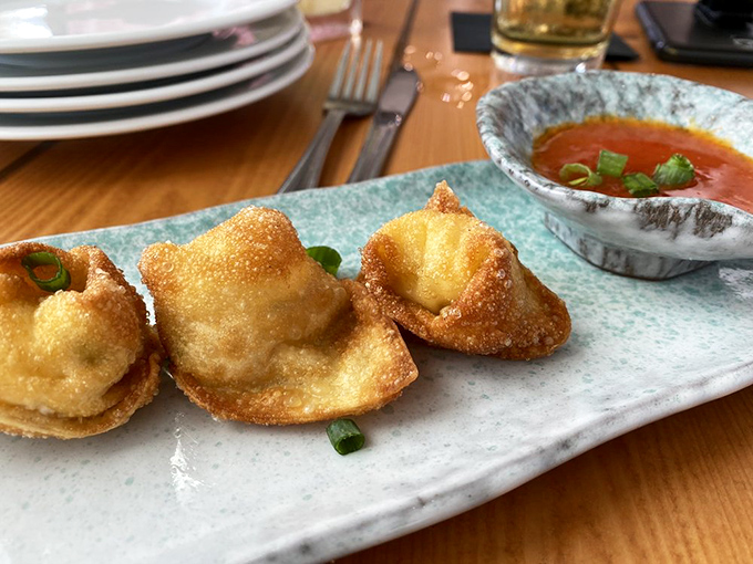 Lobster Rangoon that would make Marco Polo weep with joy. These crispy pouches deliver a perfect fusion of East-meets-Key-West in every bite.