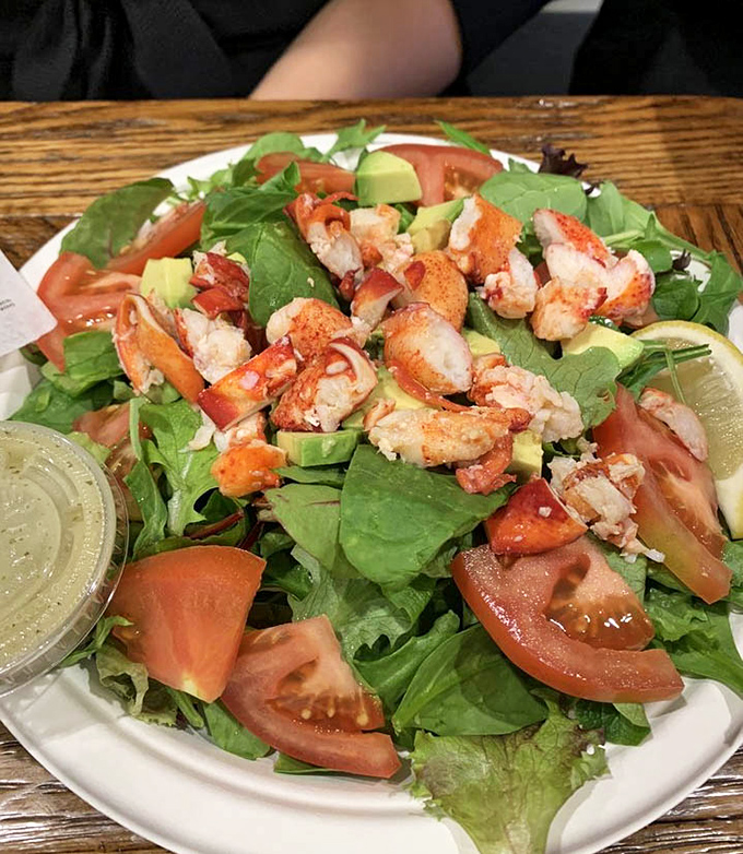 A garden of greens topped with ruby-red lobster chunks and avocado. When salads dress up for special occasions, this is what they aspire to be.
