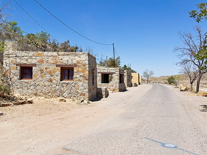 Historic stone buildings whisper tales of the dam's construction era. These sturdy structures have witnessed decades of desert sunsets and countless visitor stories. 