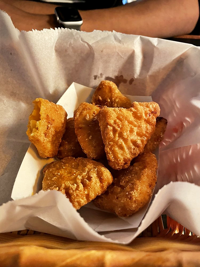 These aren't your cafeteria's mac and cheese bites. Crispy outside, creamy inside &ndash; the texture contrast that dreams are made of.