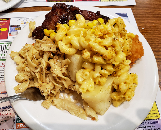 A plate that answers the eternal question: "Can one ever have too much mac and cheese?" with a resounding "No!" especially when paired with those seasoned noodles.