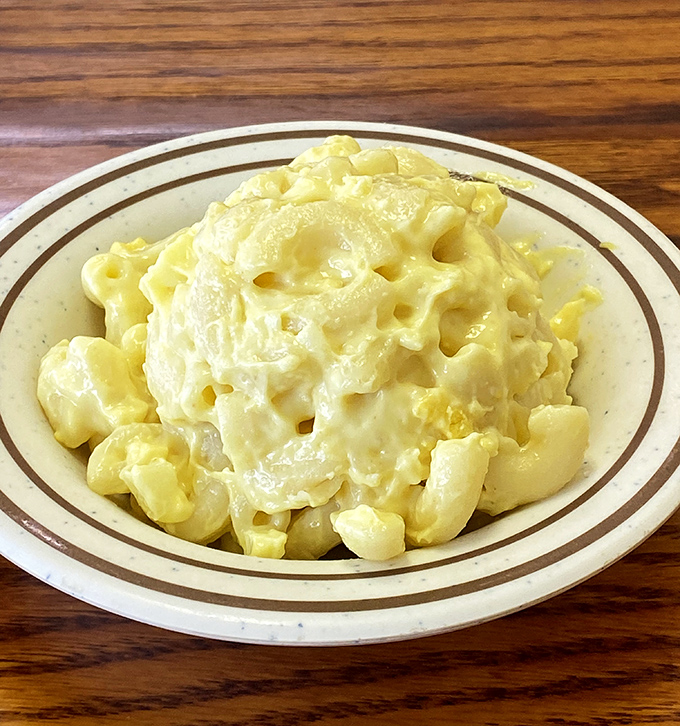 Mac and cheese that doesn't apologize for being exactly what it is: a glorious, gooey celebration of simple perfection.