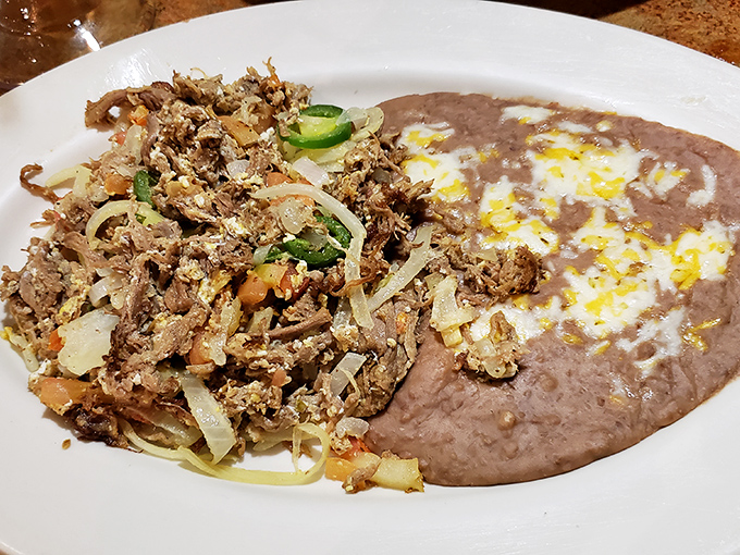 Machaca with beans&mdash;a plate that proves simplicity and complexity aren't mutually exclusive. Those jalape&ntilde;os aren't just garnish; they're exclamation points.