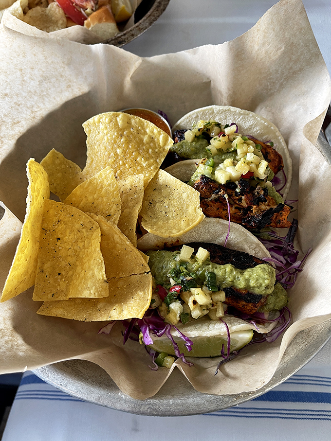 These mahi tacos aren't just lunch, they're a vacation on a plate &ndash; grilled fish, crunchy slaw, and that pineapple salsa bringing tropical vibes to every bite.
