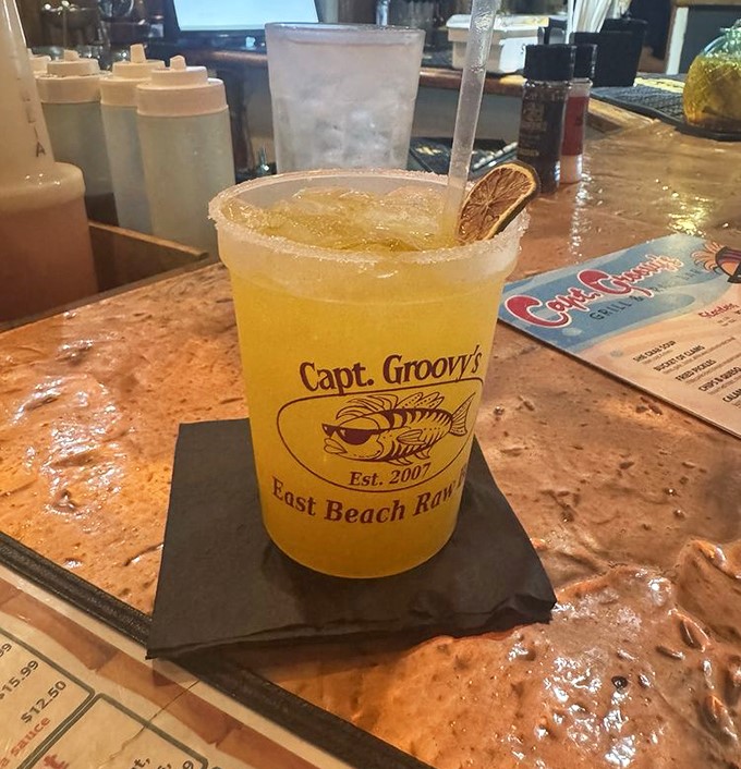 This sunshine-in-a-glass cocktail promises vacation vibes with every sip. The garnish isn't just decoration&mdash;it's a commitment to proper drinking.