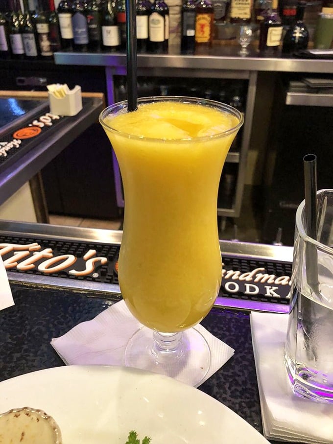 This tropical concoction brings vacation vibes to your meal. One sip of this sunshine-colored drink and you'll swear you can hear ocean waves.