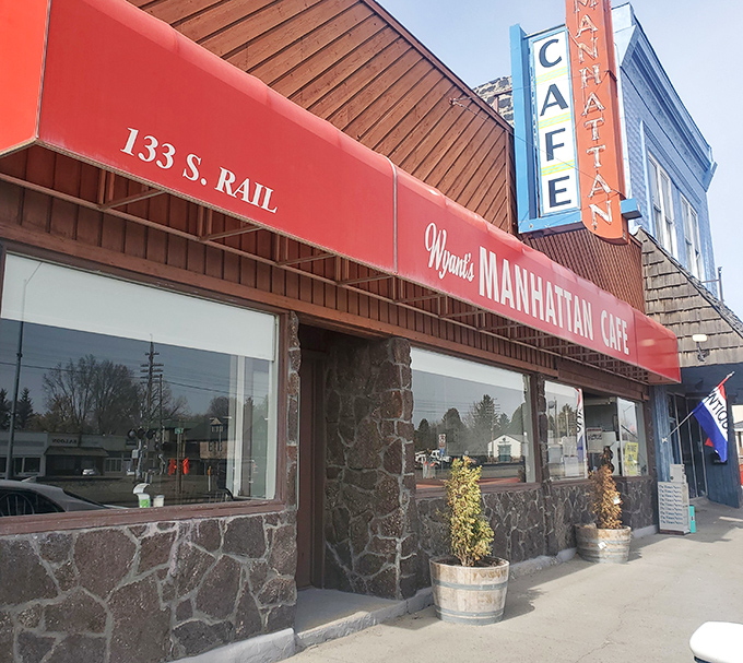 The Manhattan Cafe's classic neon sign promises comfort food that sticks to your ribs, in a place where everybody knows your name&mdash;and probably your order too.