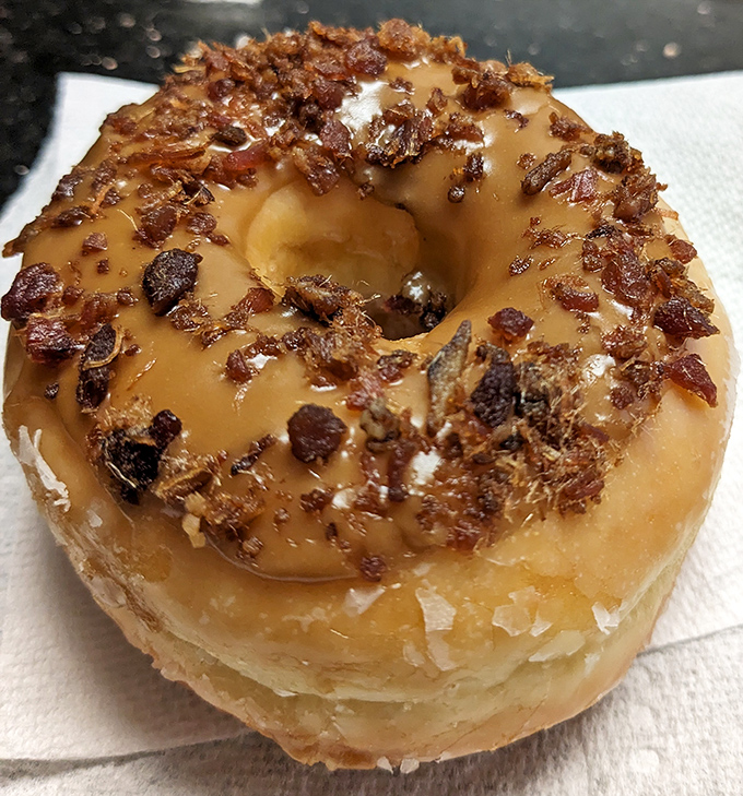 The maple bacon donut&mdash;where breakfast's greatest hits collaborate on one magnificent stage. Sweet, savory, and utterly irresistible.
