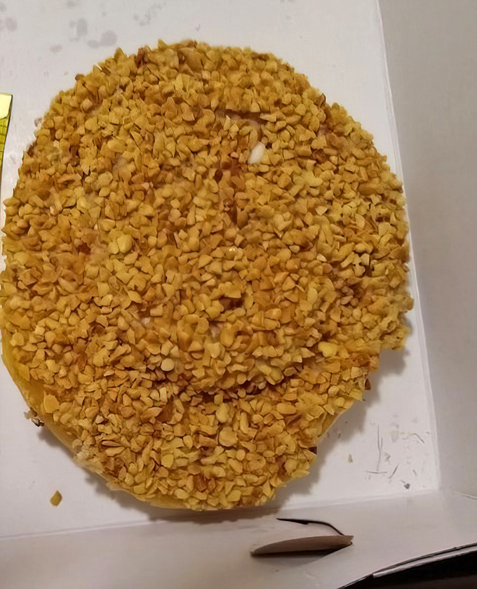 The maple nut donut—where the crunch of nuts meets the sweet embrace of maple icing in a romance that was clearly meant to be.