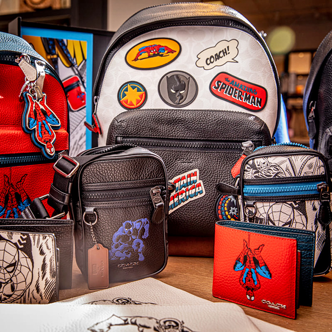 Superhero merchandise that lets adults indulge their inner 10-year-old while maintaining the dignity of a leather Coach wallet.