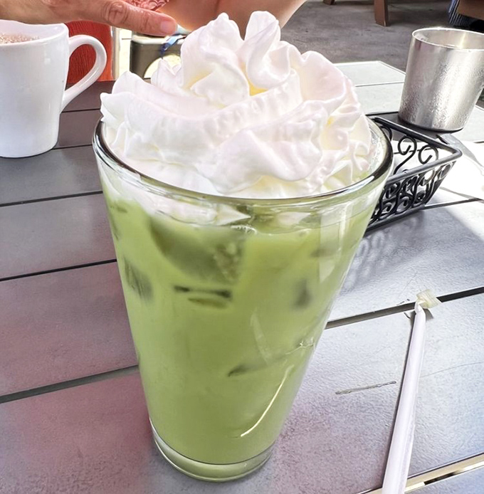 This matcha melon tea topped with cloud-like whipped cream isn't just a drink&mdash;it's what summer would look like if it were a beverage.