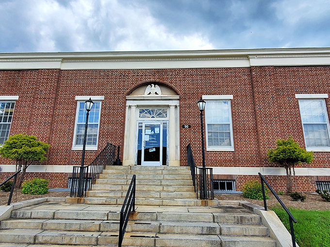 The McDowell County Public Library welcomes knowledge-seekers with classic brick symmetry and accessibility&mdash;retirement's intellectual playground.