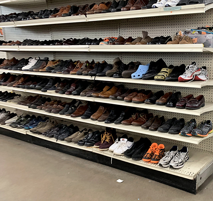 Men's shoes lined up like hopeful dance partners, each pair with its own history and miles left to travel.