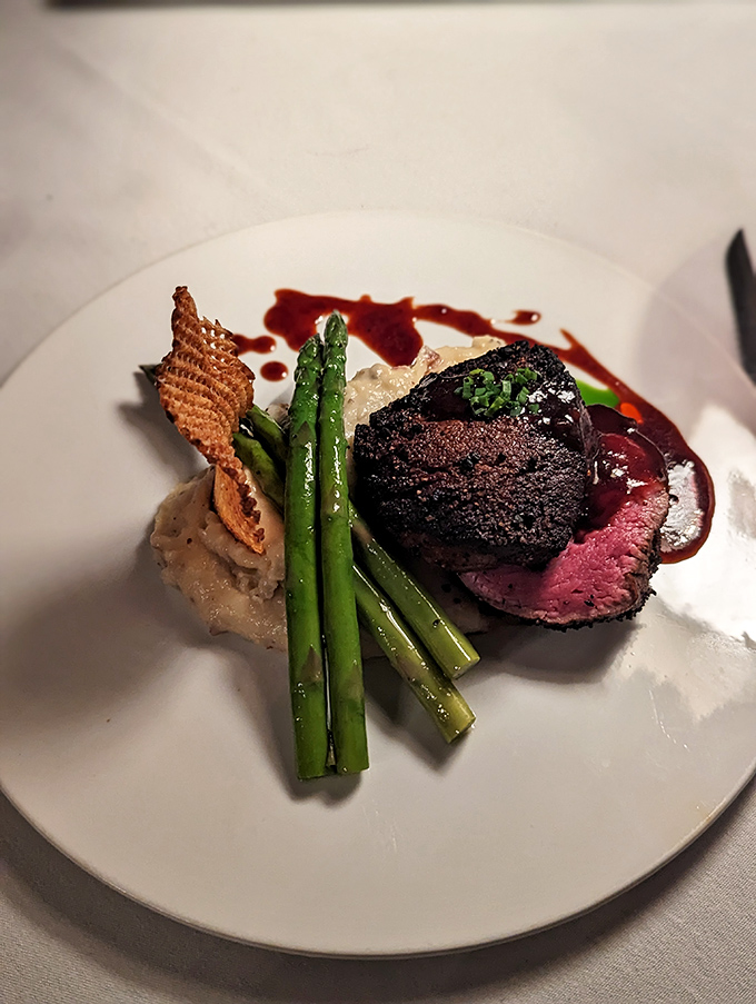 The filet mignon's perfect pink center surrounded by that mahogany crust is the culinary equivalent of finding a unicorn.