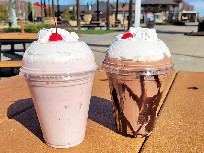 Milkshakes crowned with whipped cream and cherries &ndash; one strawberry, one chocolate &ndash; standing tall like the dessert version of American Gothic.