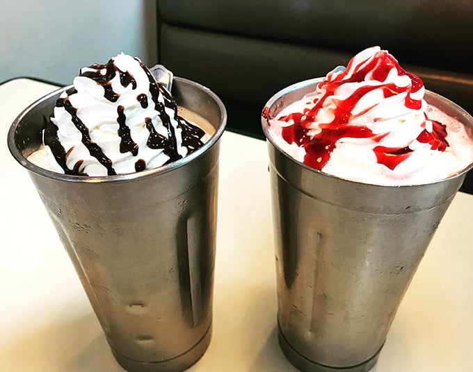 Milkshakes served in those metal mixing cups – the bonus second serving that makes you feel like you've gotten away with something deliciously sneaky.