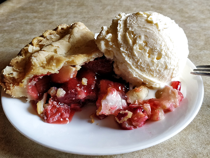 Flaky crust, warm berry filling, and a scoop of vanilla ice cream slowly melting into sweet surrender. Pie nirvana achieved.
