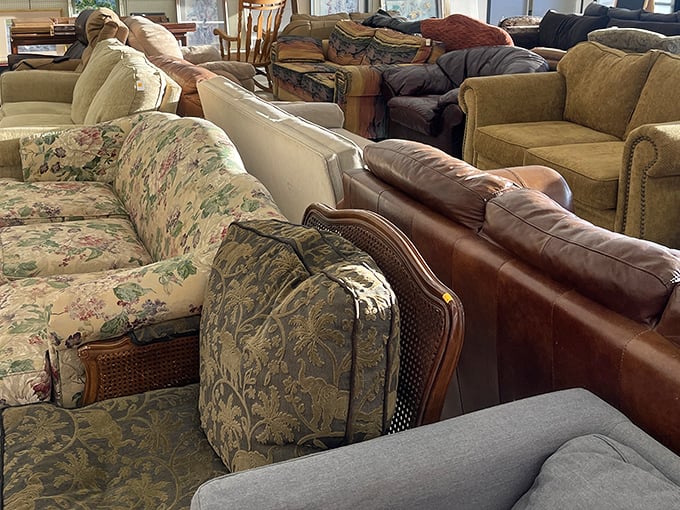 The sofa section: where floral patterns from three decades collide in a surprisingly harmonious testament to American living room history.