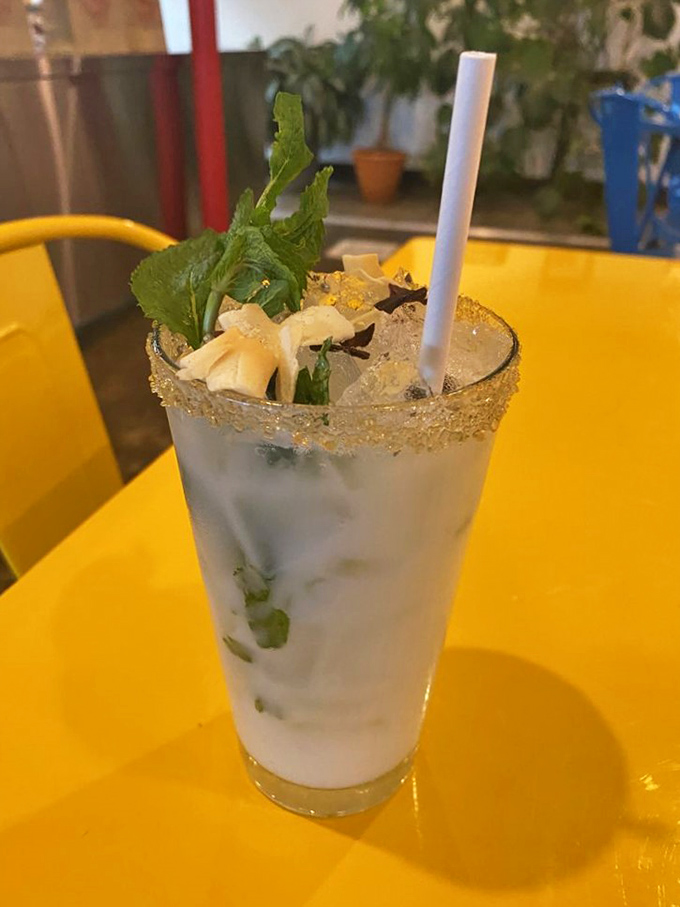 This isn't just a mojito; it's a vacation in a glass. Fresh mint, lime, and a sugared rim transport you straight to a Caribbean coastline.